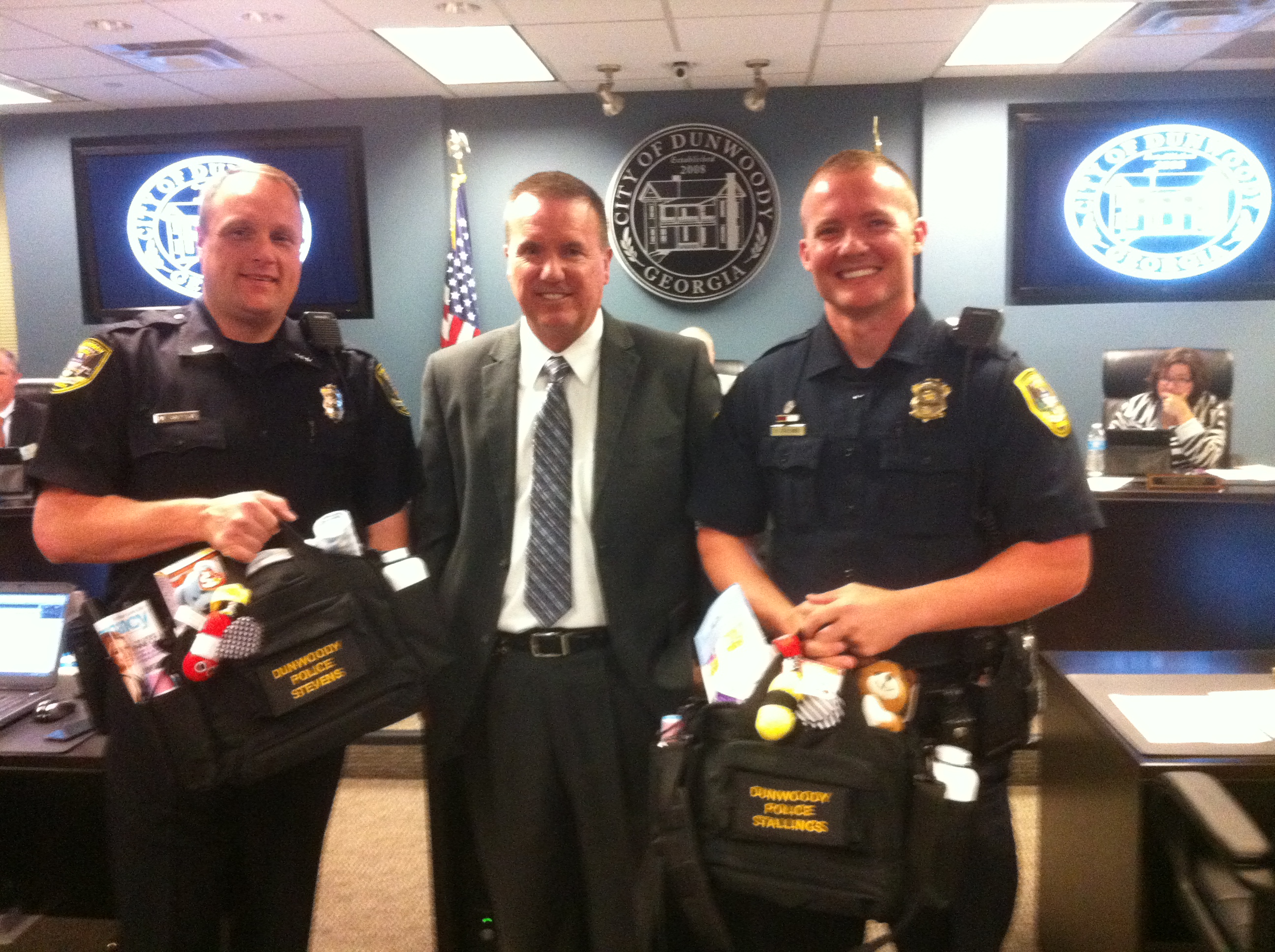 Dunwoody police officers honored for changing diapers, reviving a heart ...