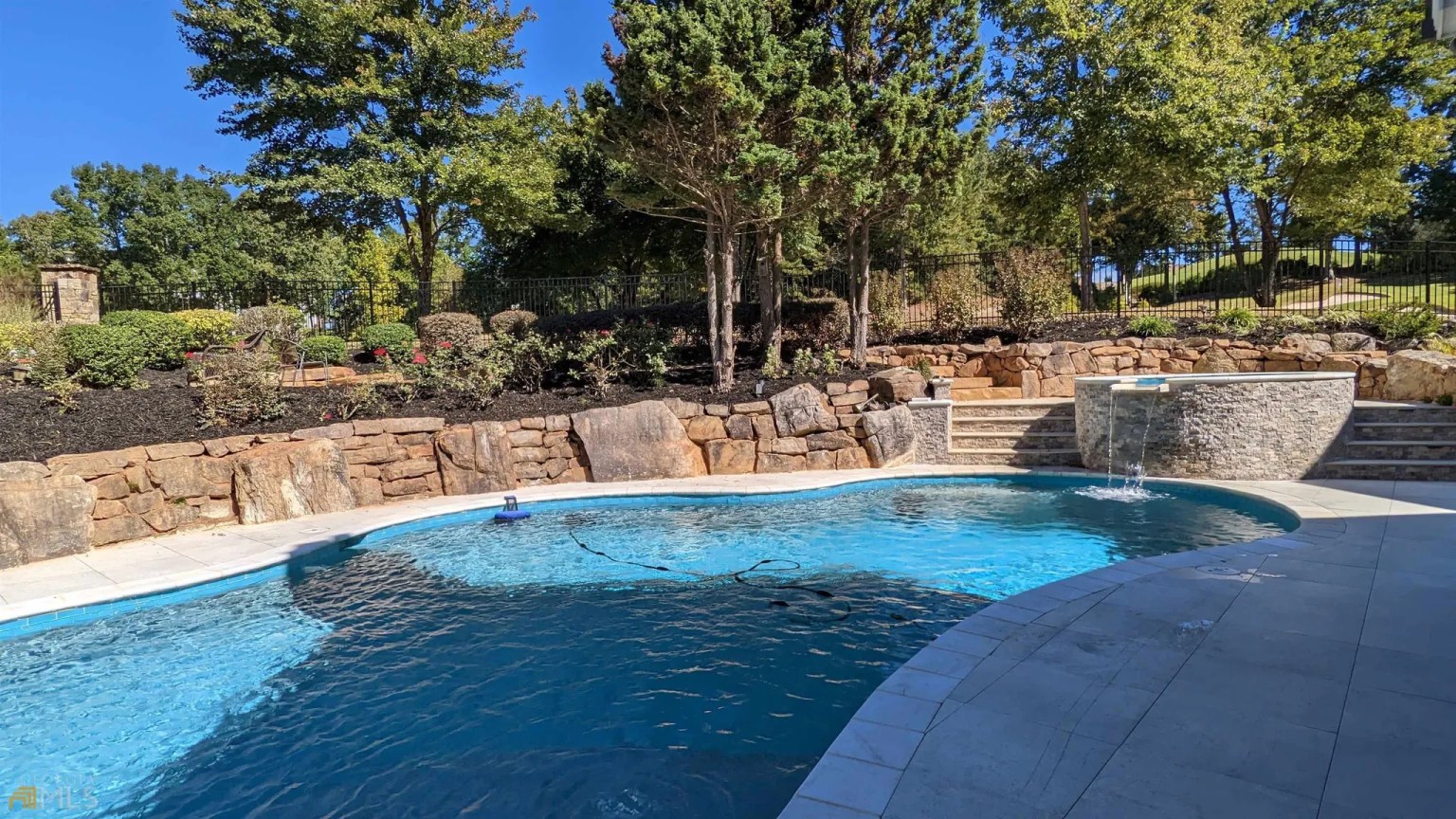 Take a look at this Milton mansion with golf course views and private ...